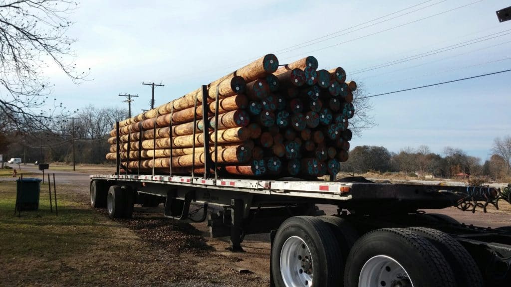 Utility Pole Transport: Ship Wood Pilings with Next Exit Logistics